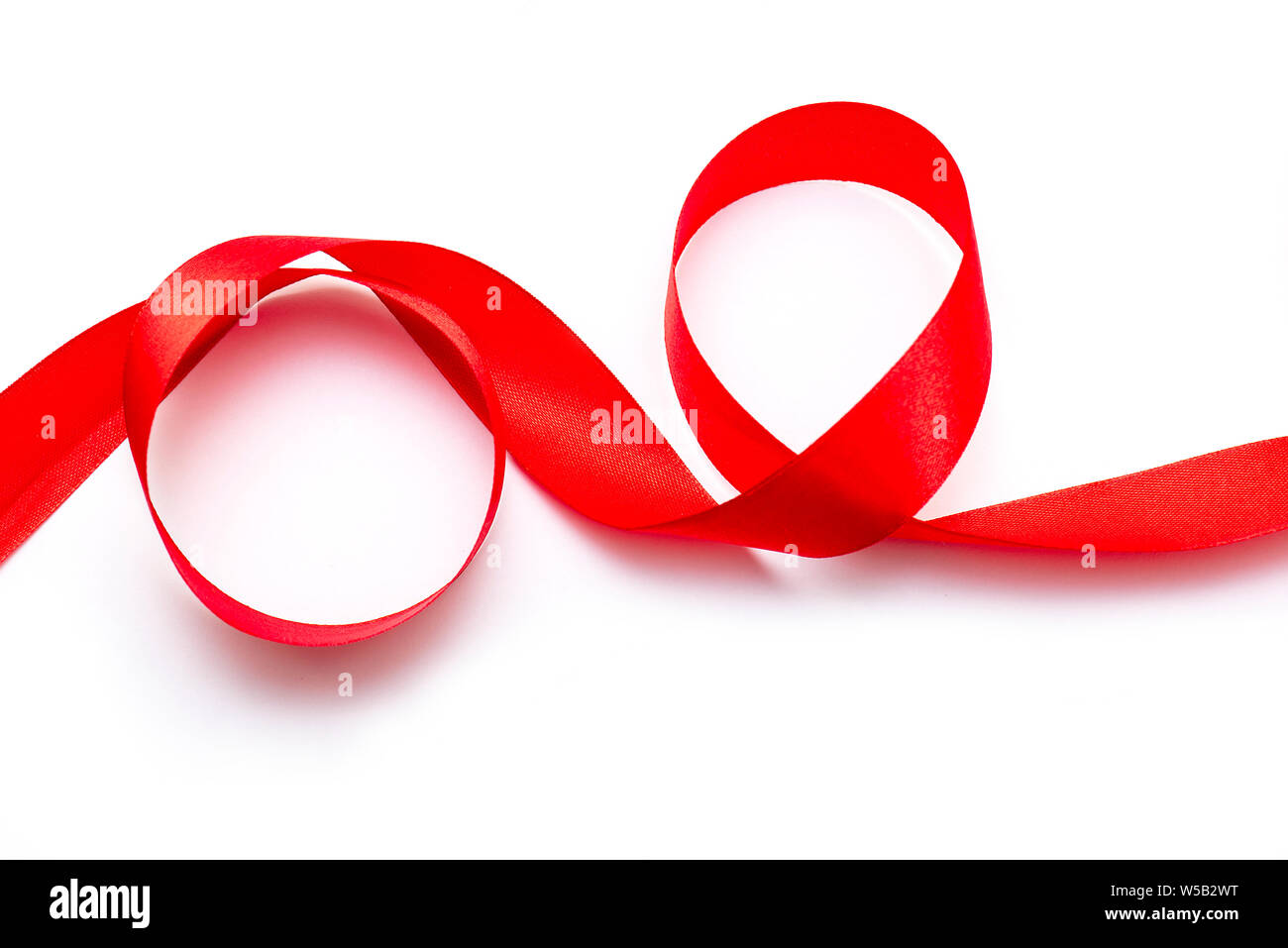 Red curly Ribbon Tape Band top View isolated on white Background Stock ...