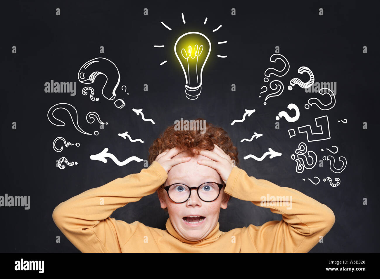 Child with exam on blackboard background with lightbulb Stock Photo - Alamy