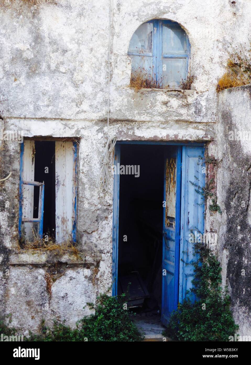 Rustic Door of Cave Home in Santorini Stock Photo - Alamy