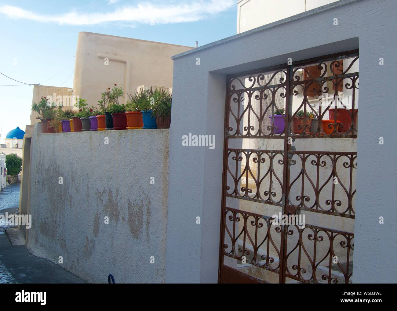 Home Gate and Wall in a Greek Village Stock Photo - Alamy