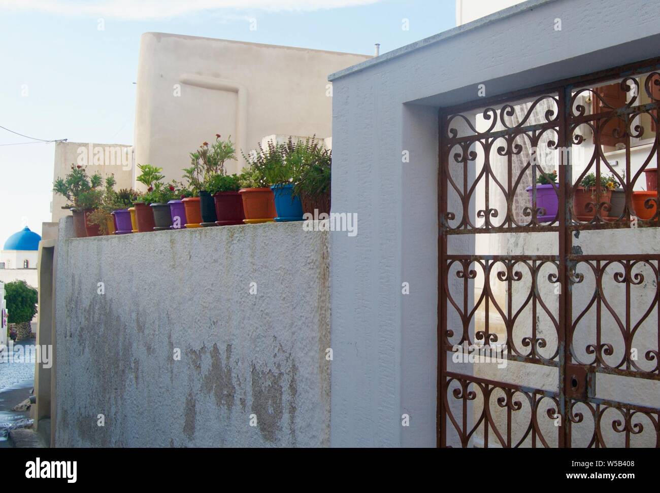 Wall and Gate of home in a Greek Village Stock Photo - Alamy
