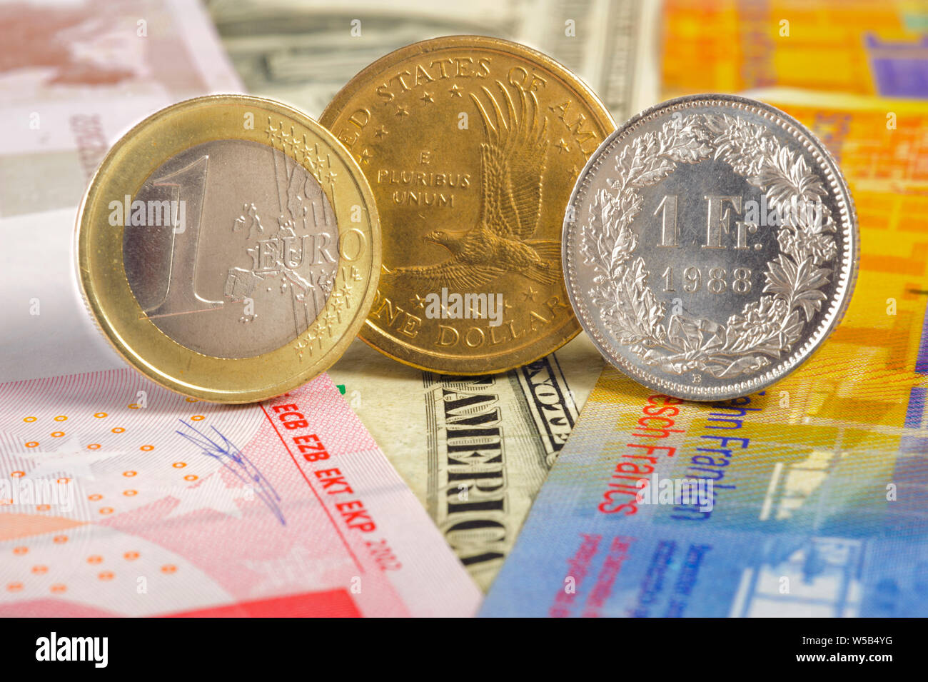 banknotes and coins of different currencies Stock Photo - Alamy