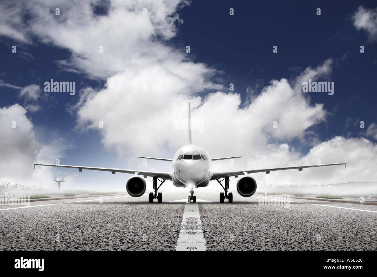 Aircraft landing in the airport Stock Photo - Alamy