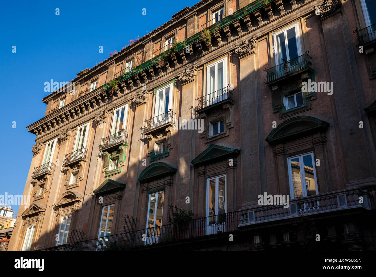Beautiful facades of the antique buildings in Naples old city Stock ...