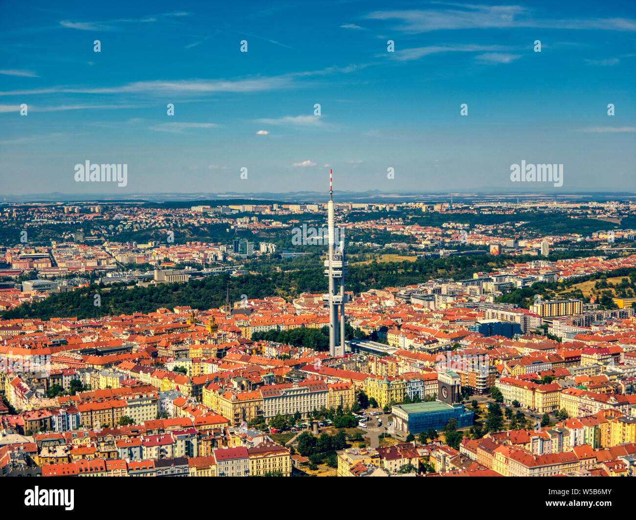 aerial view of TV tower in Prague Zizkov under hot summer and clouds ...