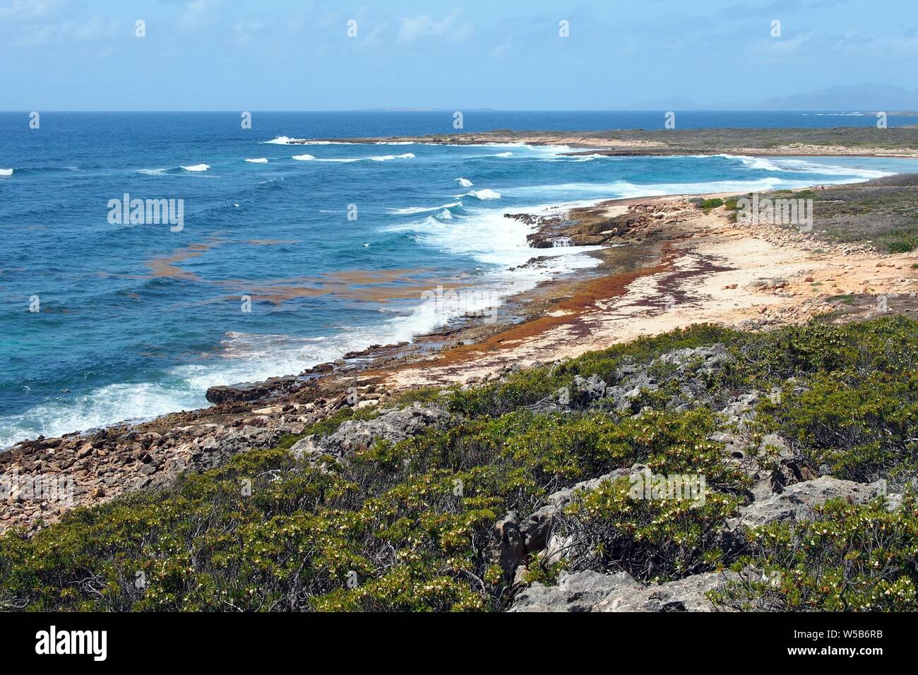 Waves, scrub and rocky limestone - Windward Point, Anguilla, BWI ...