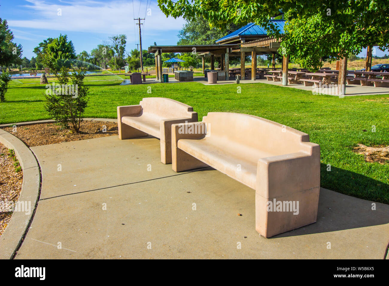 Two Benches At Public Park In Early Morning Stock Photo - Alamy