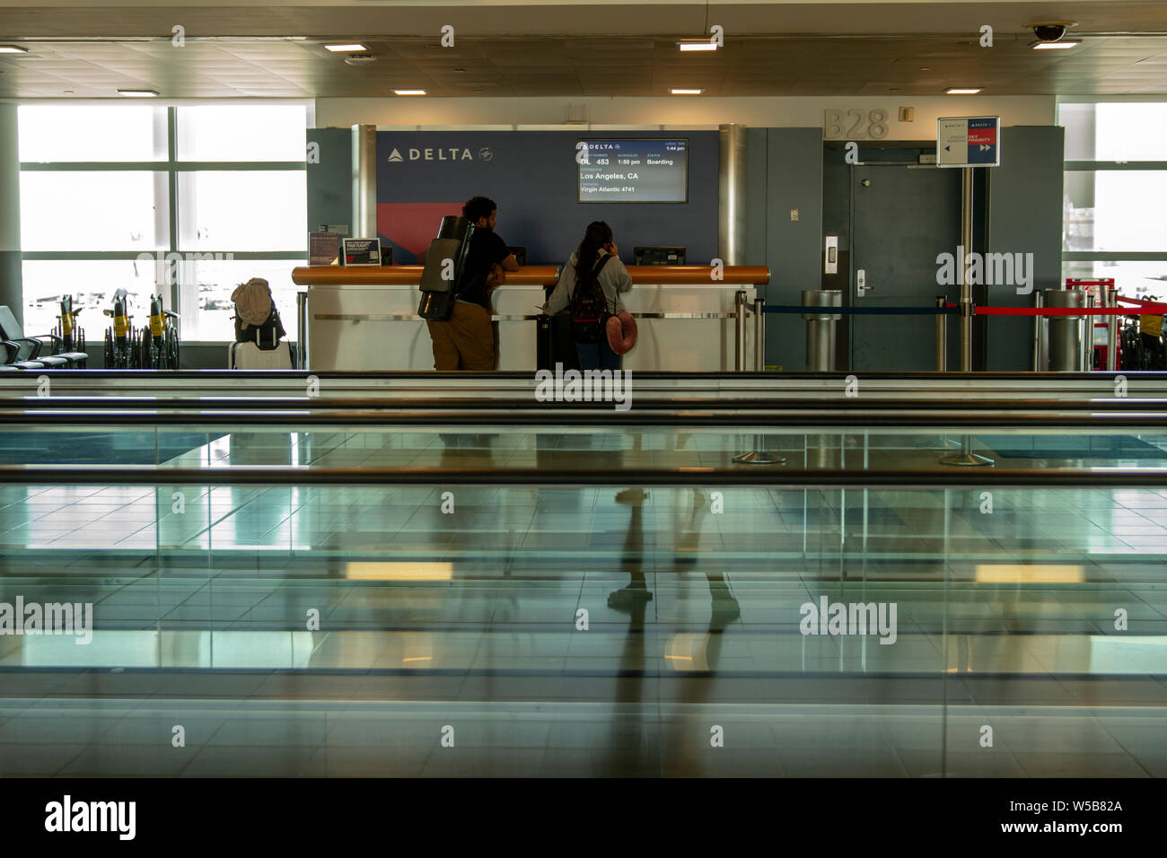 Busy airport terminal Stock Photo - Alamy