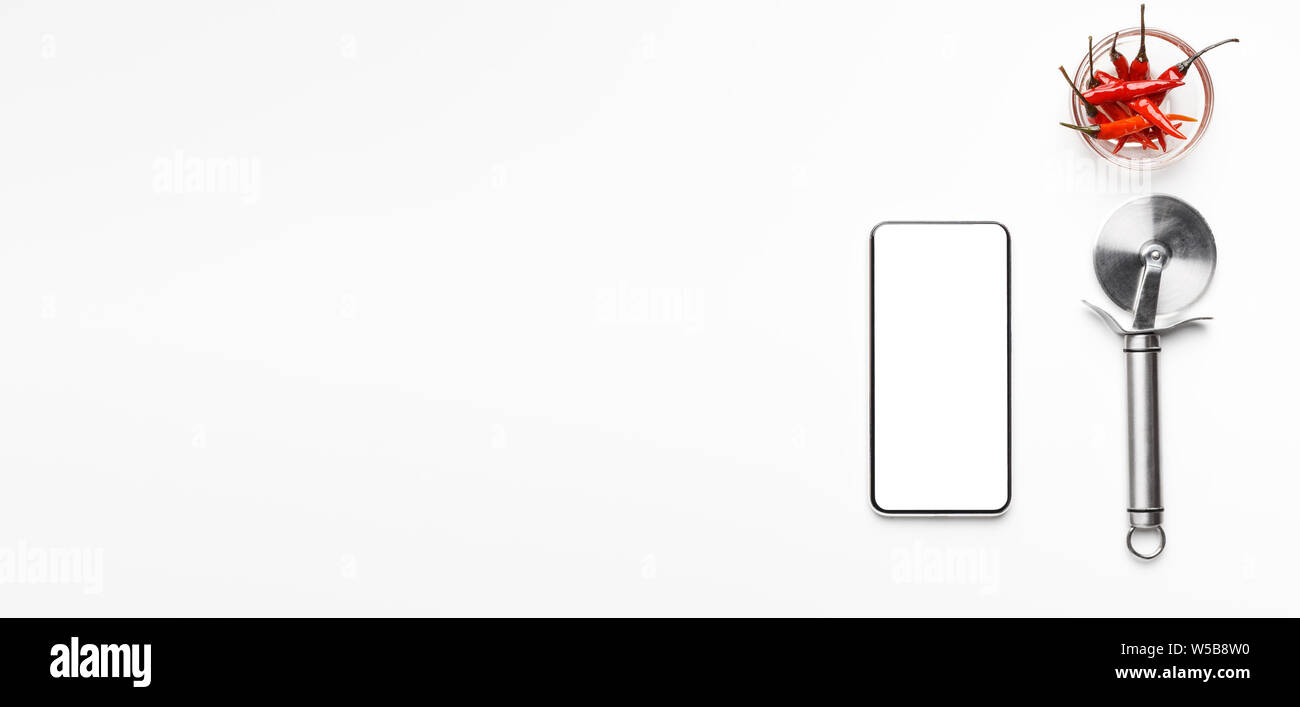 Pizza delivery. Phone with blank screen and cutter Stock Photo - Alamy