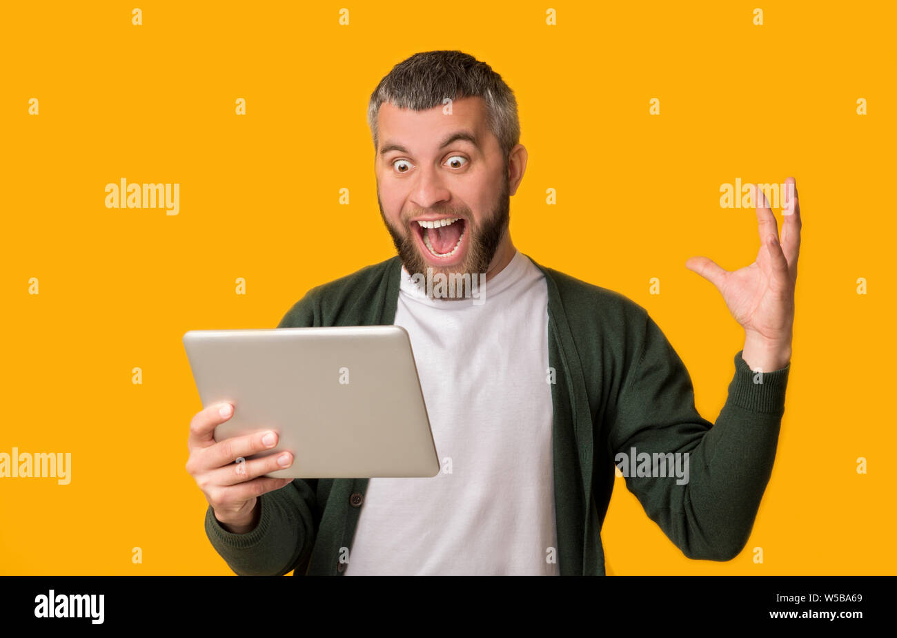 Bearded happy man screaming hi-res stock photography and images - Alamy
