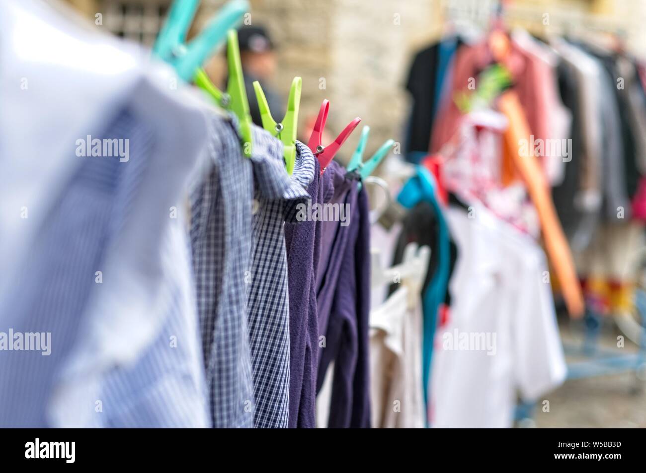 used cloting on a leash Stock Photo - Alamy