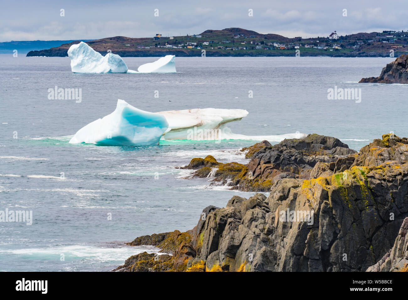 Iceberg floating in the ocean off the coast of Newfoundland, Canada ...