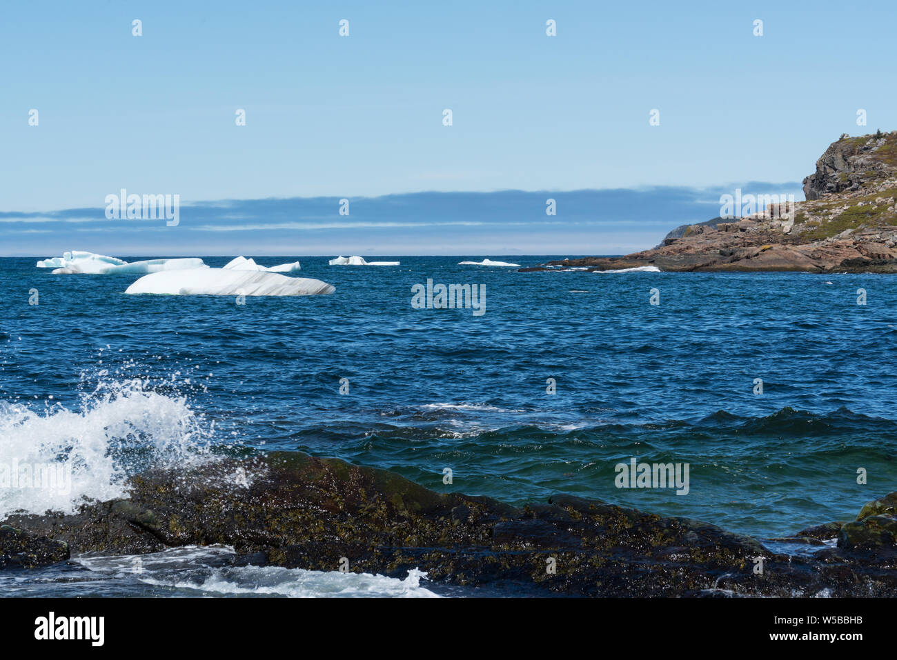 Iceberg floating in the ocean off the coast of Newfoundland, Canada ...