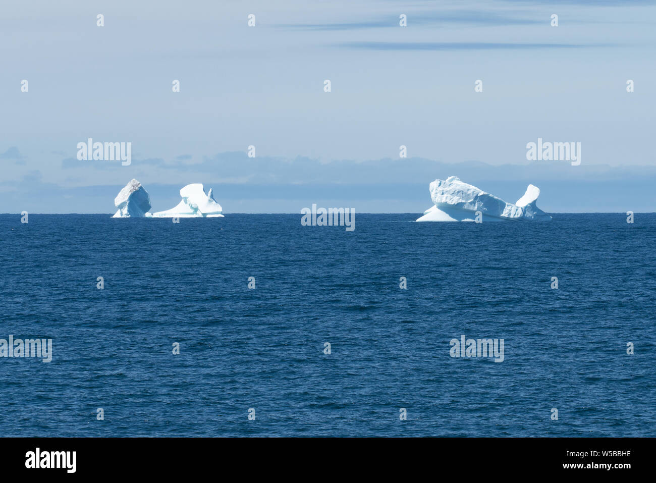 Iceberg floating in the ocean off the coast of Newfoundland, Canada ...