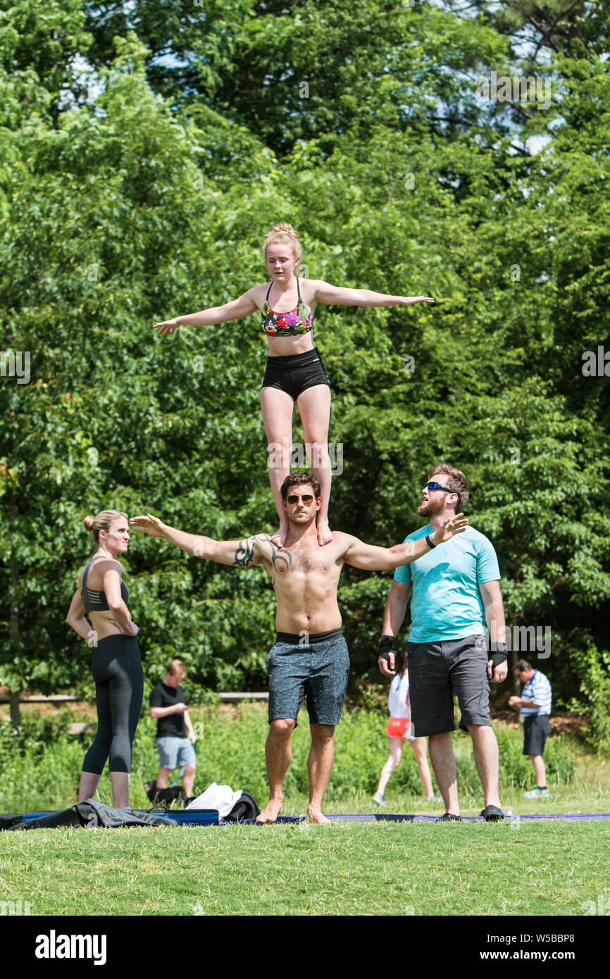 Woman Standing On Men