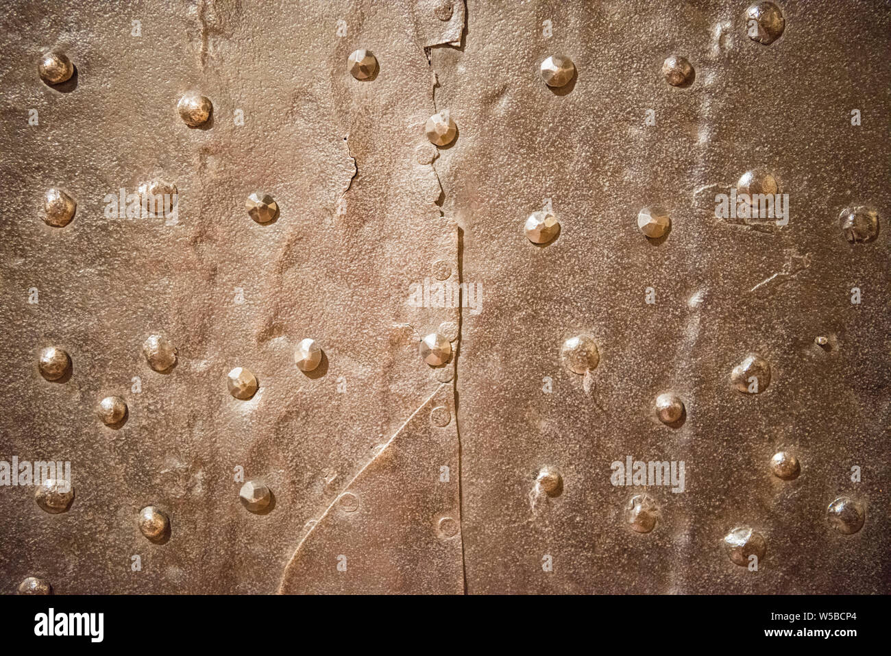 Metal rusty background with rivets Stock Photo - Alamy