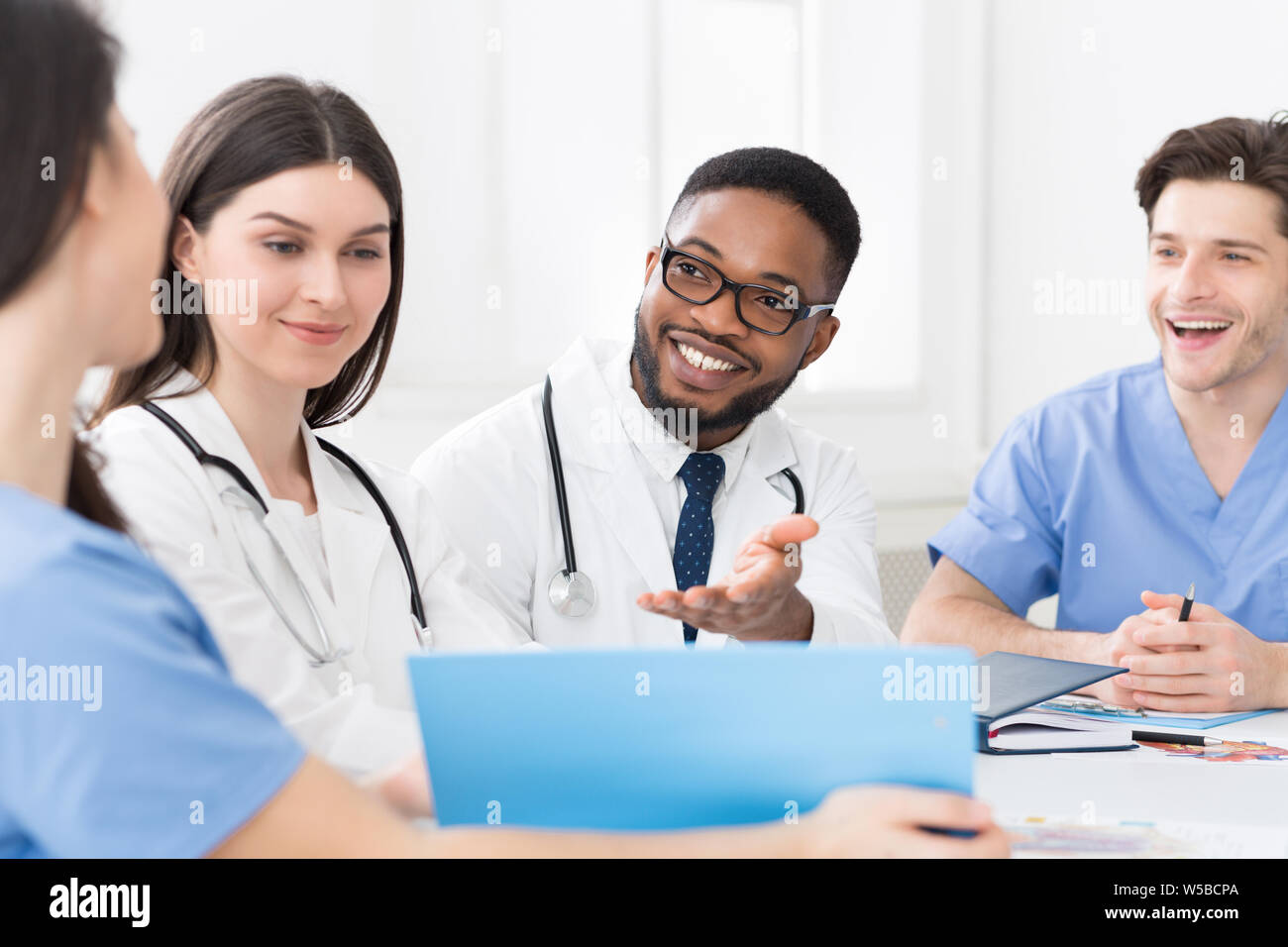 Medical staff having discussion in modern hospital Stock Photo - Alamy