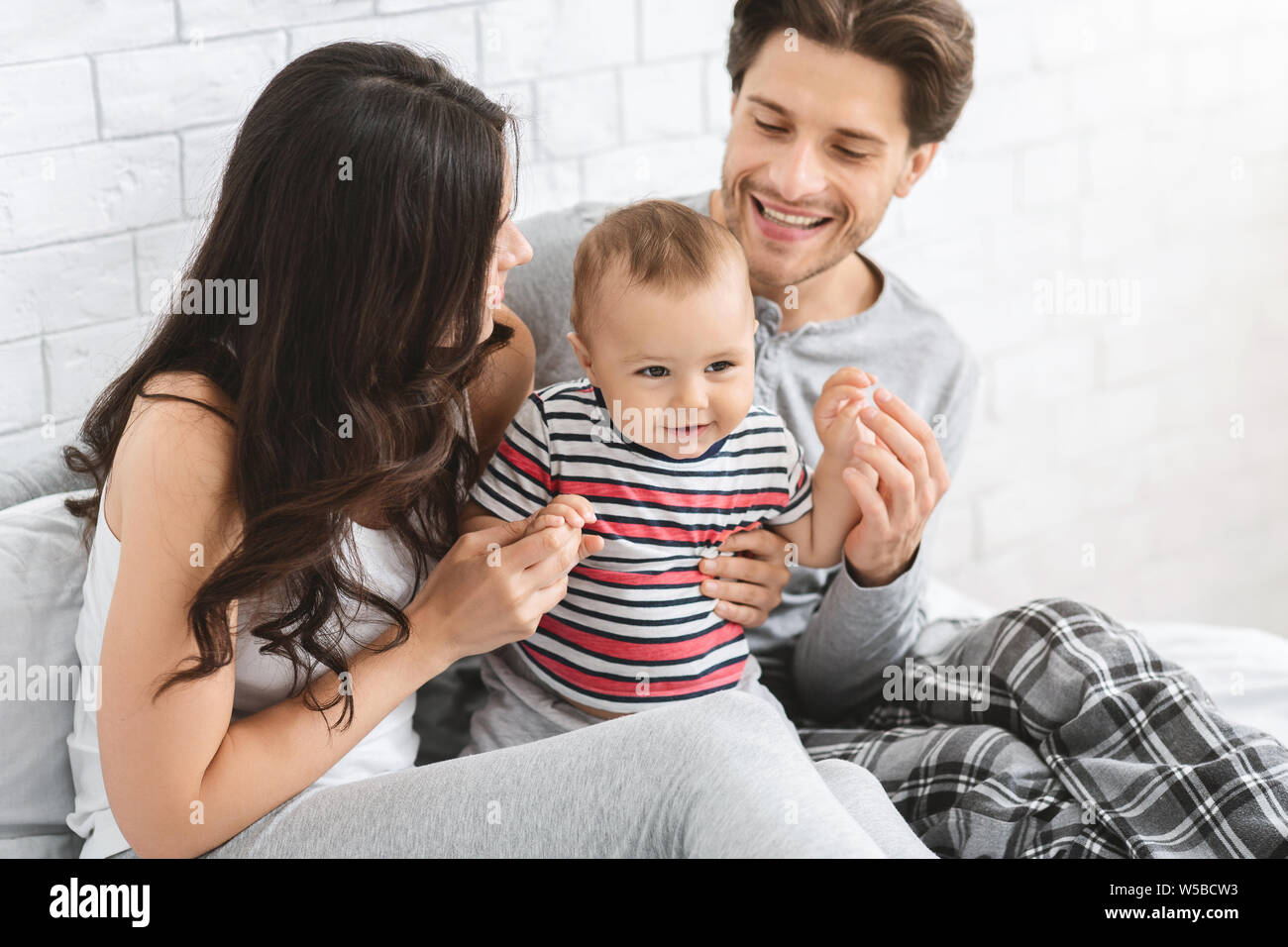 Cheerful parents hi-res stock photography and images - Alamy