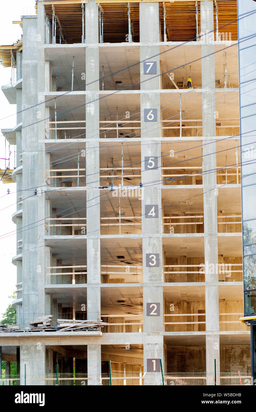 Modern building under construction detail, concrete frame, window ...