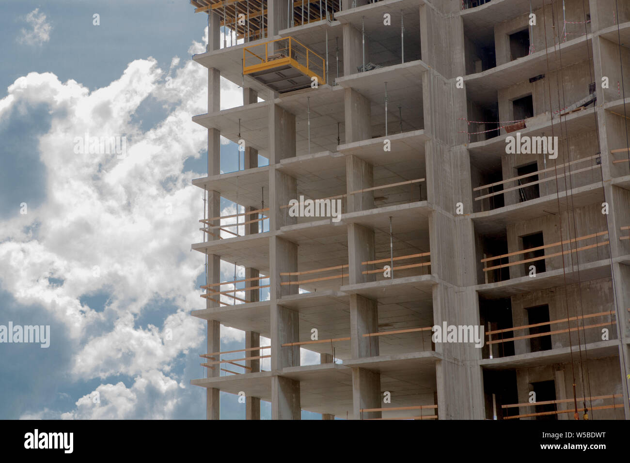Modern building under construction detail, concrete frame, window ...