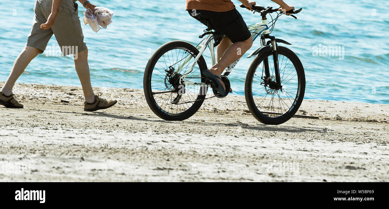 Biker riding along beach hi-res stock photography and images - Alamy