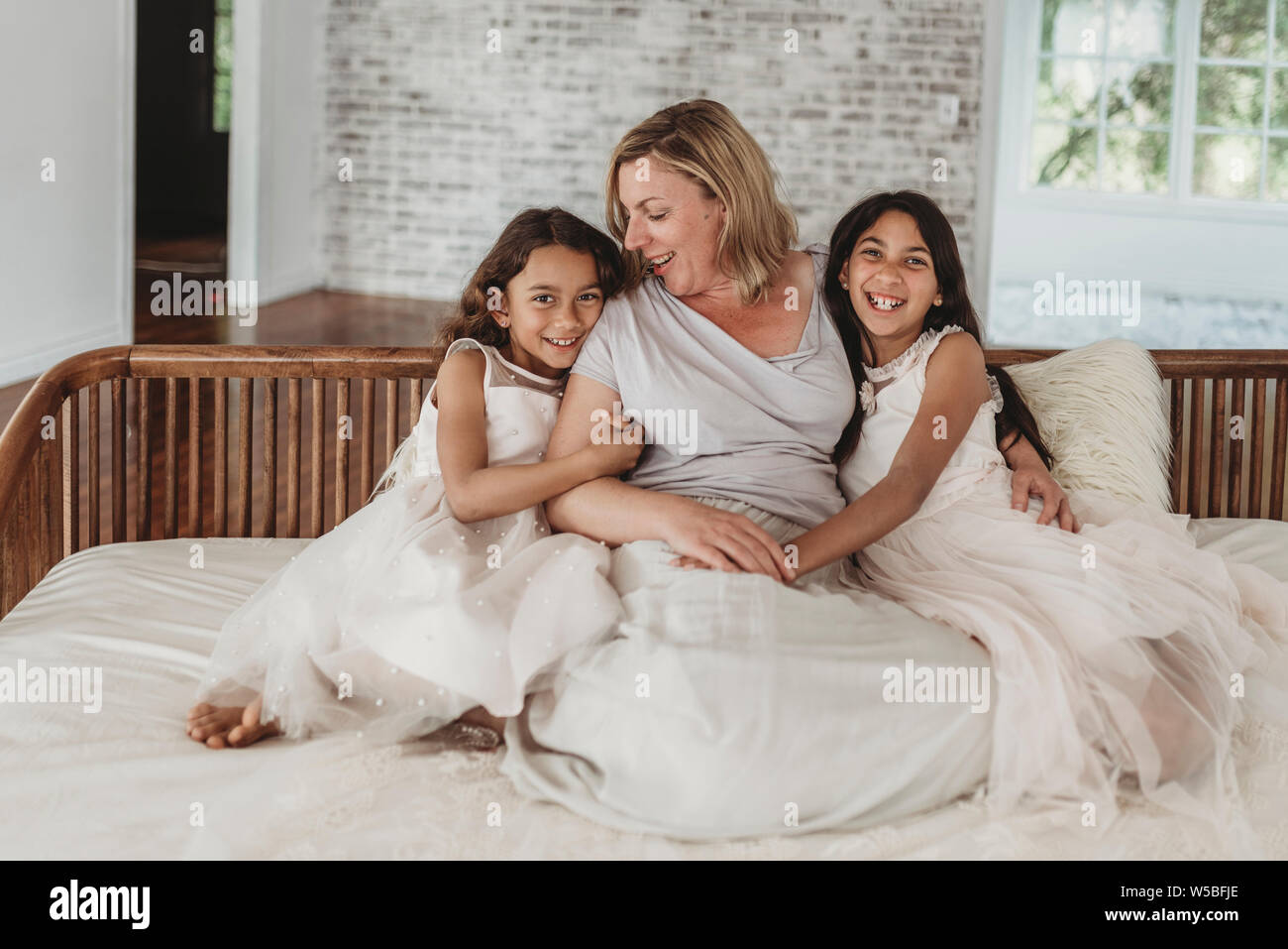 Portrait of mother with two daughters hi-res stock photography and ...