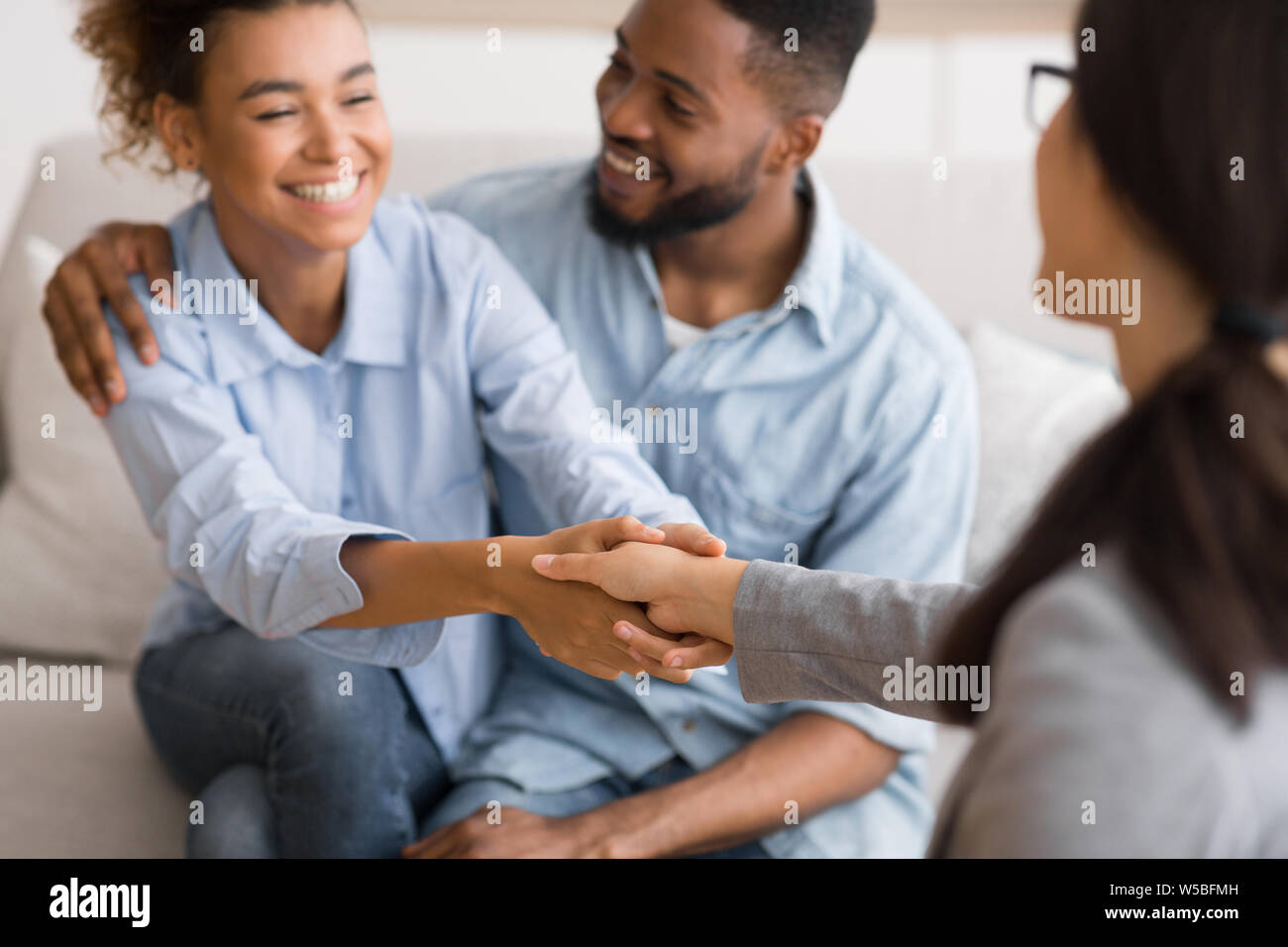 Cheerful man handshaking hi-res stock photography and images - Alamy
