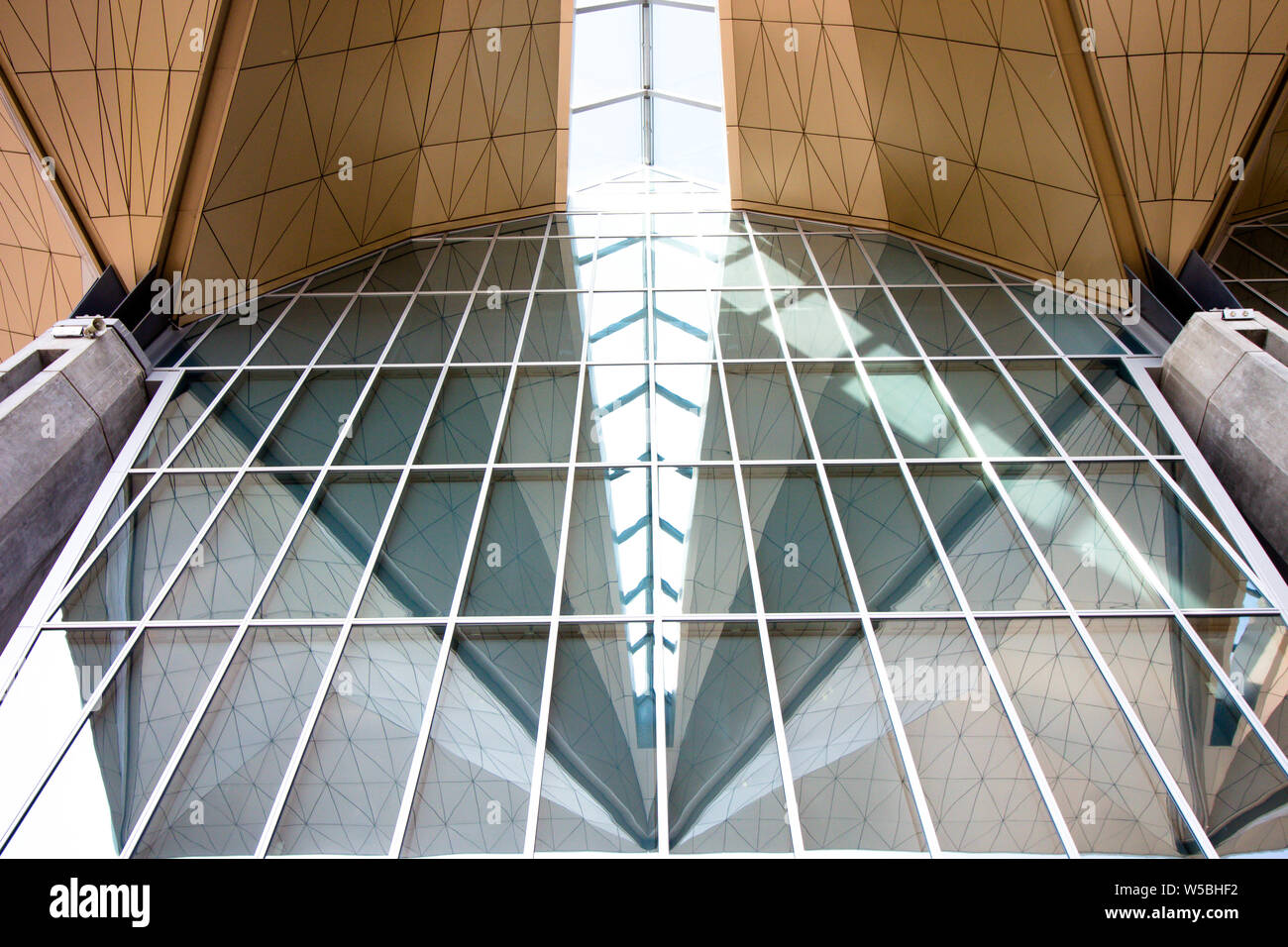 An architectural construction from glass and metal. Beautiful city ...