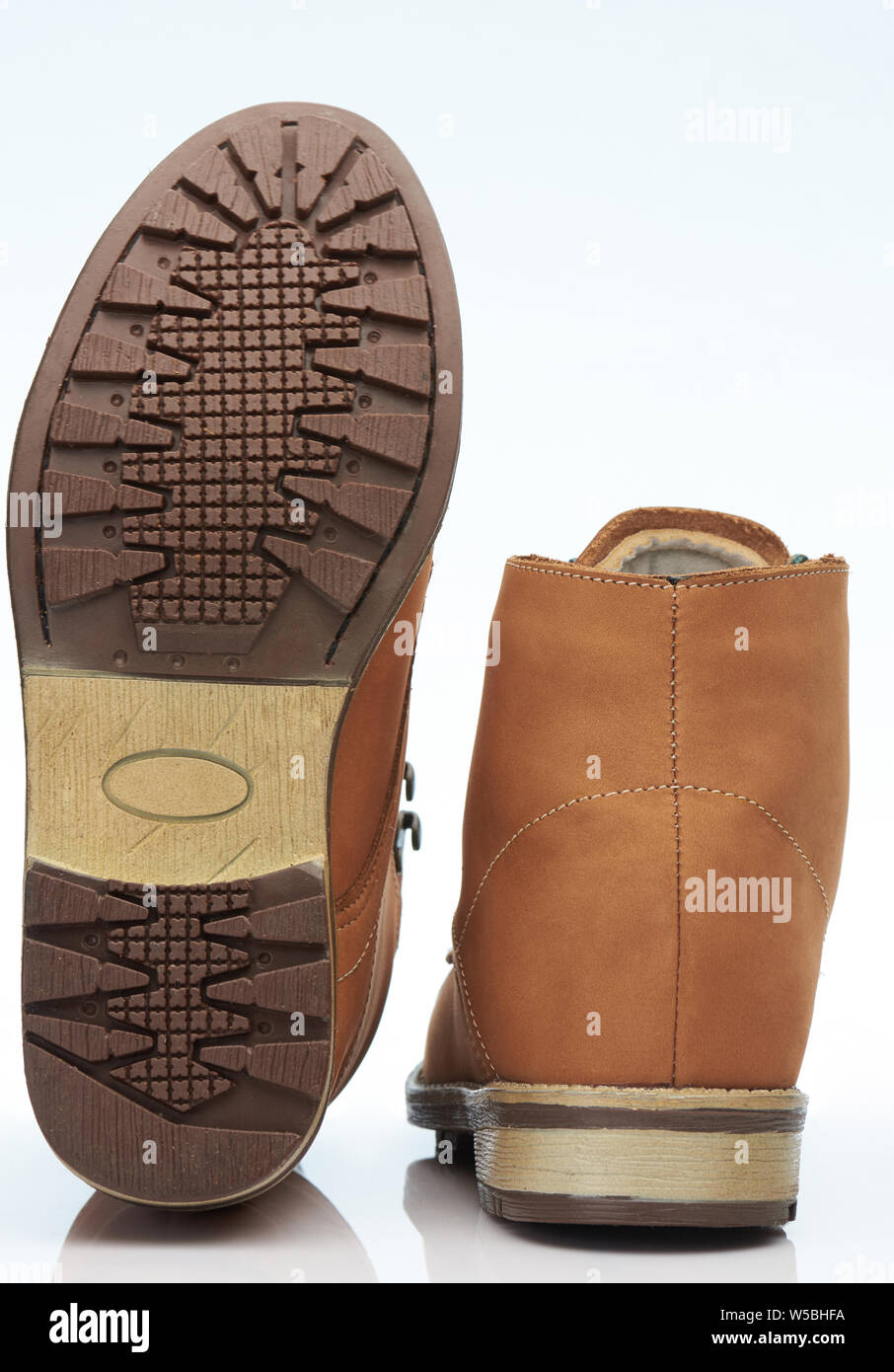 Casual brown tall shoes sole and back view isolated Stock Photo - Alamy