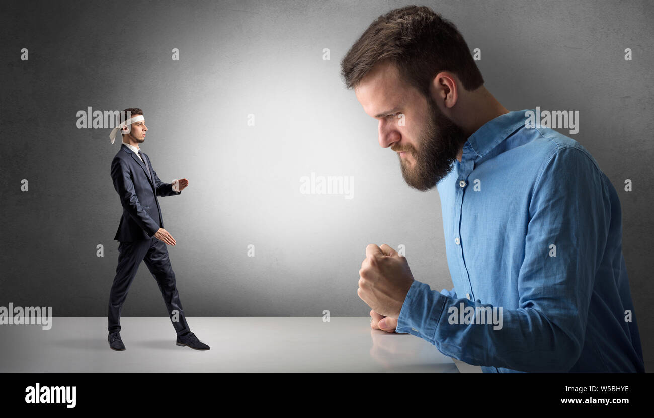 Giant hipster man yelling at a small karate man Stock Photo - Alamy