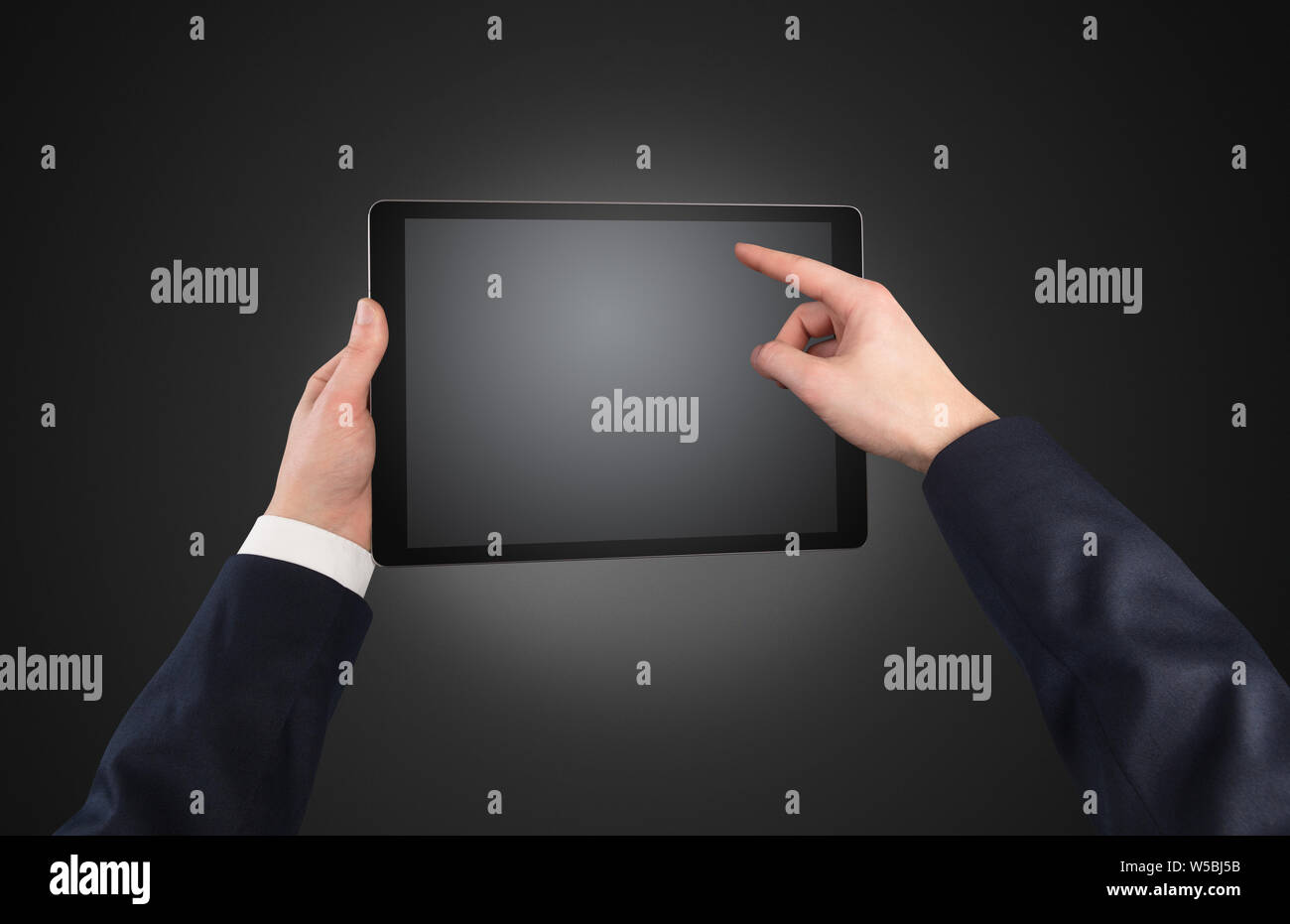 Hand using tablet with no concept and empty space Stock Photo - Alamy