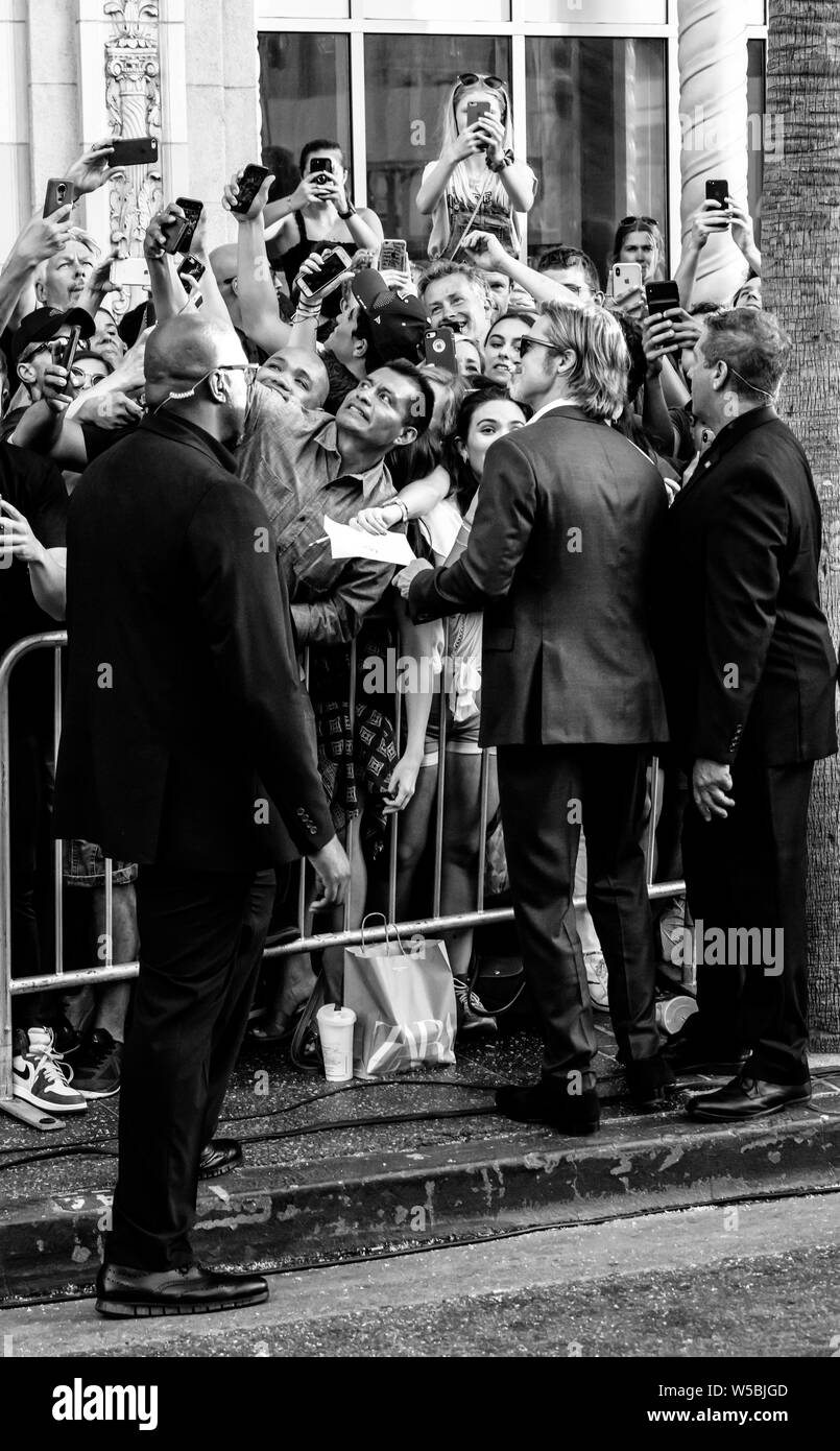 Los Angeles, CA - July 22, 2019: Brad Pitt poses for fans before The ...