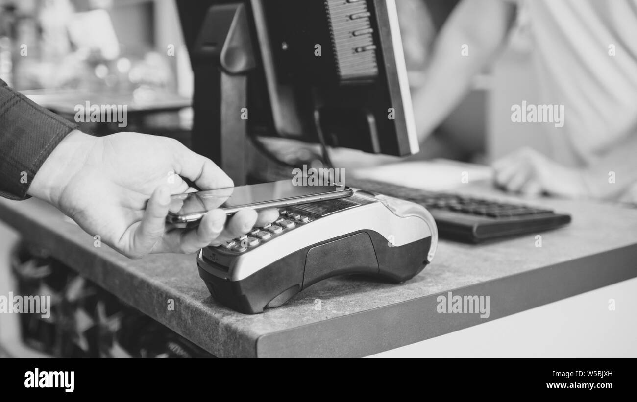 Mobile payment store Black and White Stock Photos & Images - Alamy
