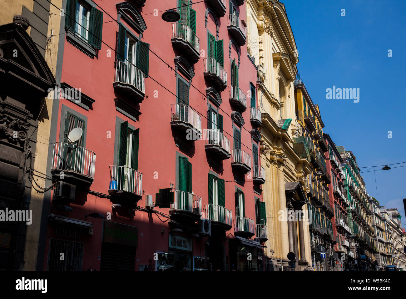 NAPLES, ITALY - APRIL, 2018: Beautiful facades of the antique buildings ...
