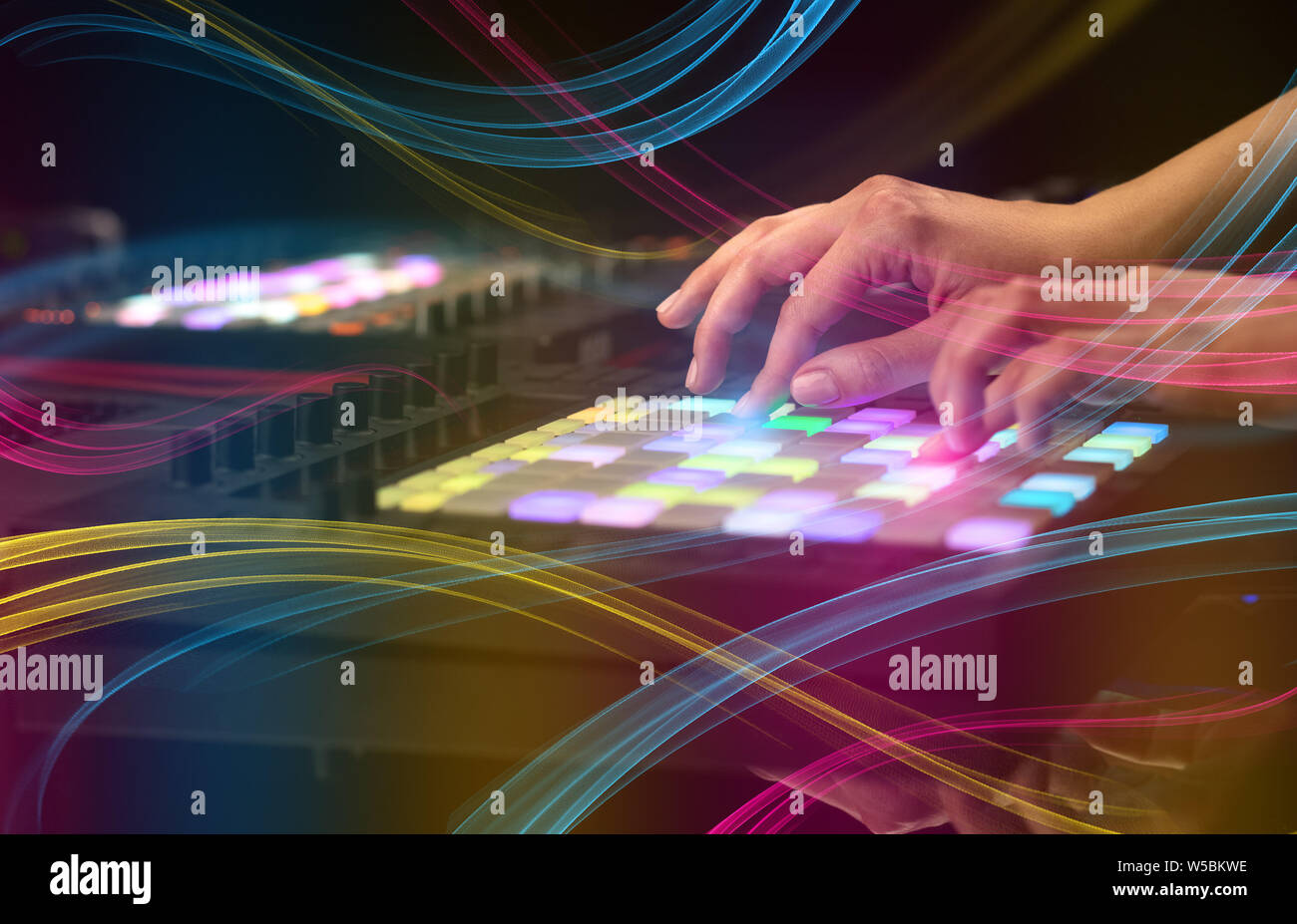 Hand mixing music on midi controller with colorful vibe concept Stock ...