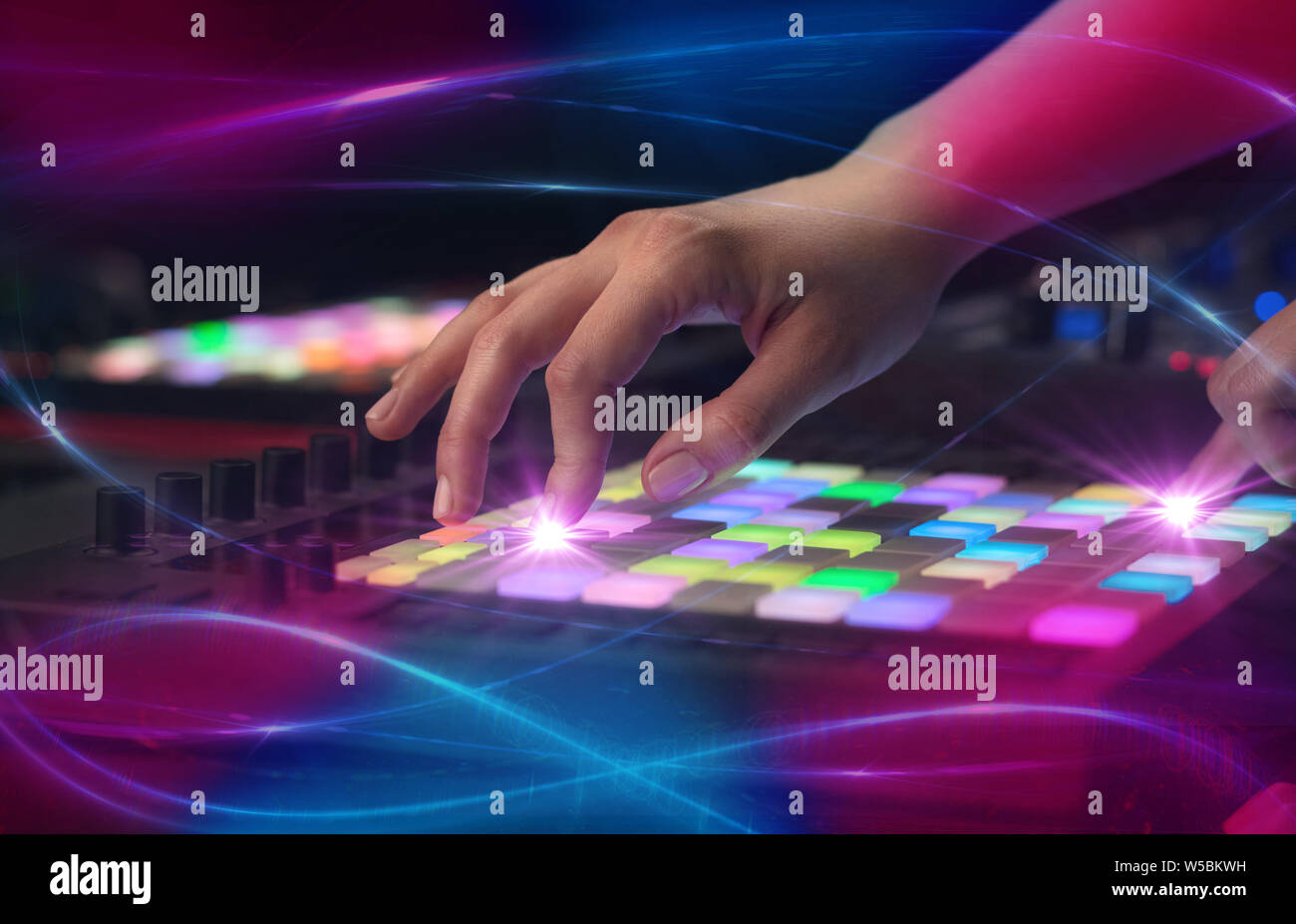 Hand mixing music on midi controller with wave vibe concept Stock Photo ...