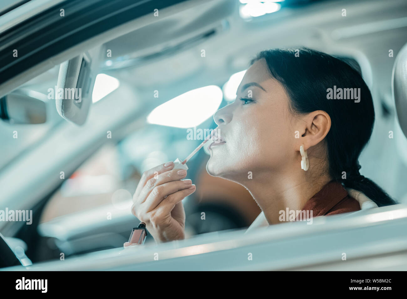 Beautiful woman getting ready for her working day Stock Photo - Alamy
