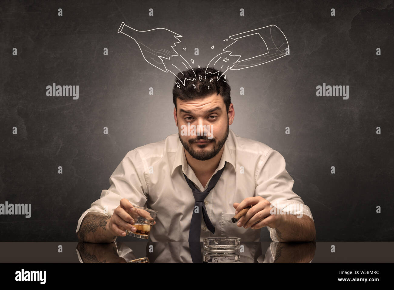 Drunk down and out man with doodle alcohol bottles concept Stock Photo ...