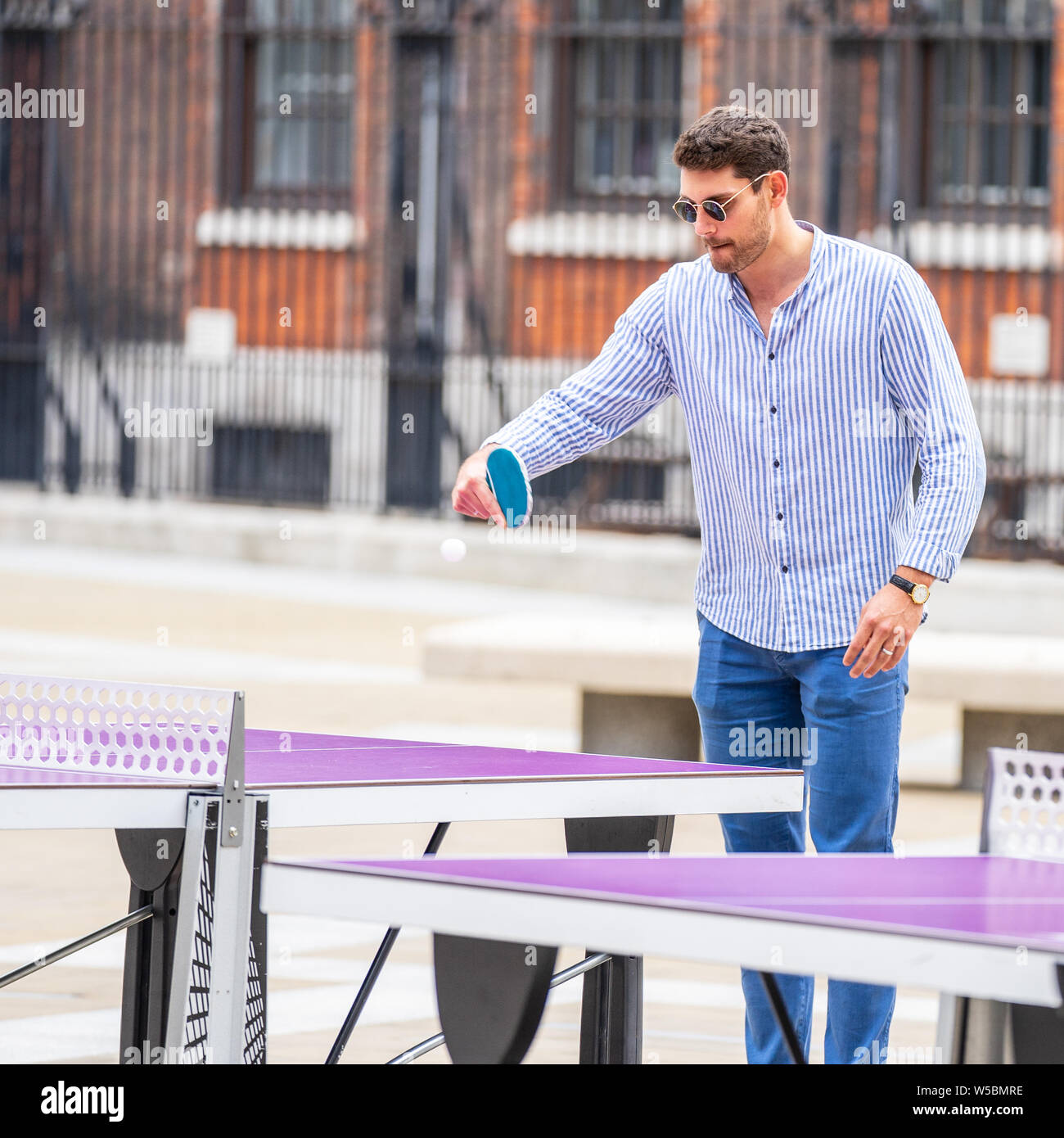 London, UK, July 14, 2019. People playing ping pong near St Pauls ...