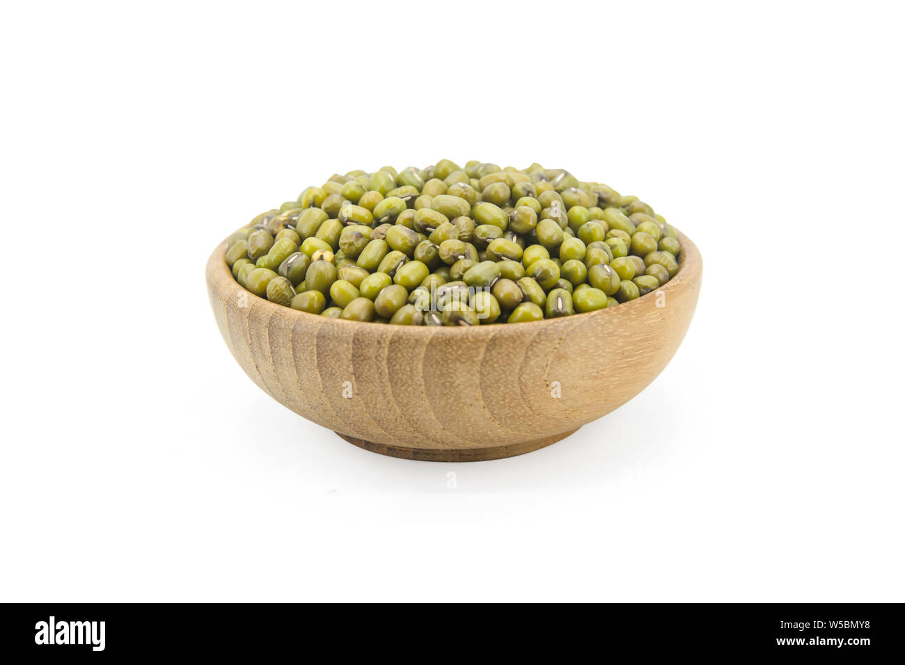 Mung beans in wood bowl isolated on white background with clipping path ...
