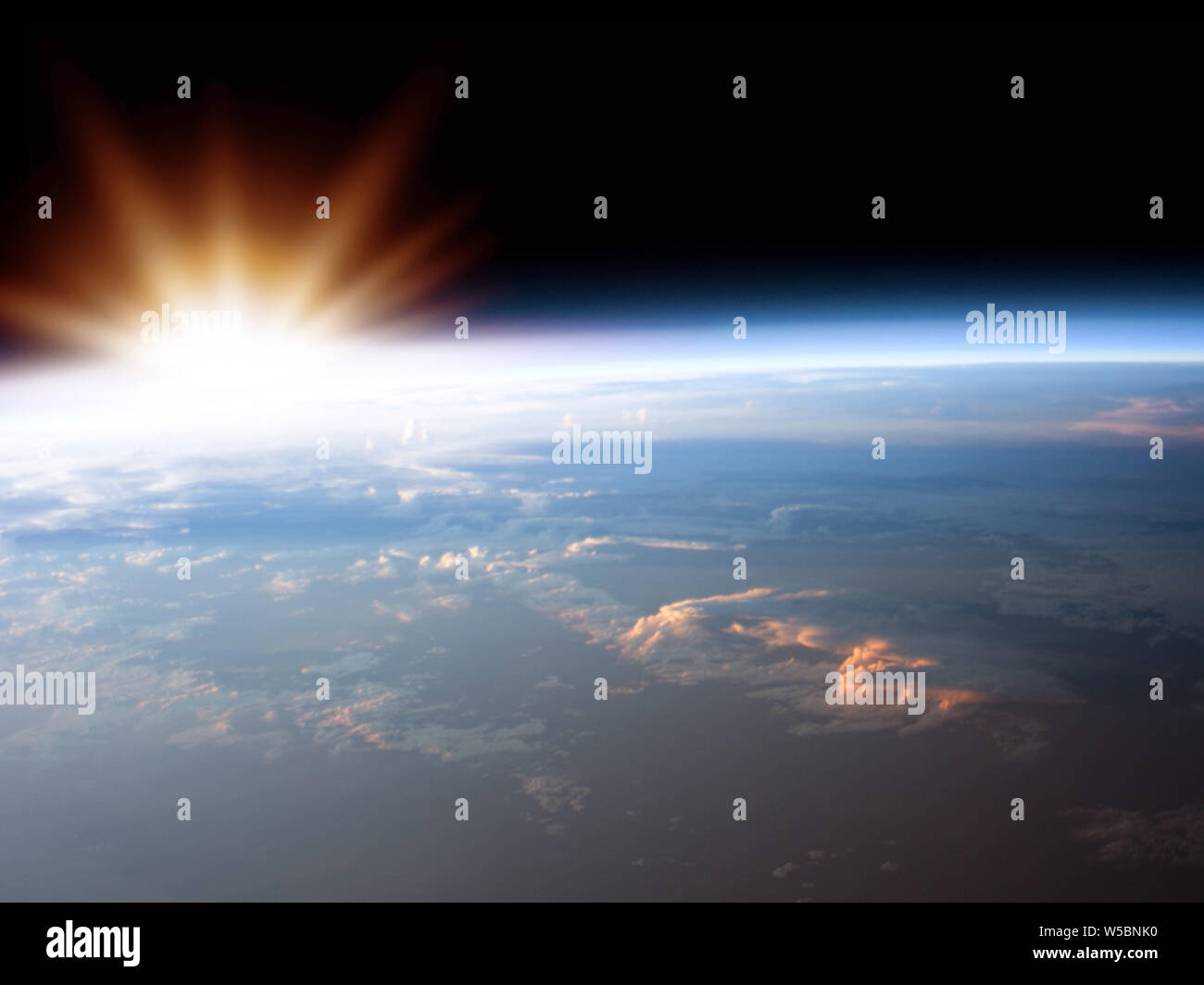 Sunrise over the Earth on ocean with sunlight and universe concept ...