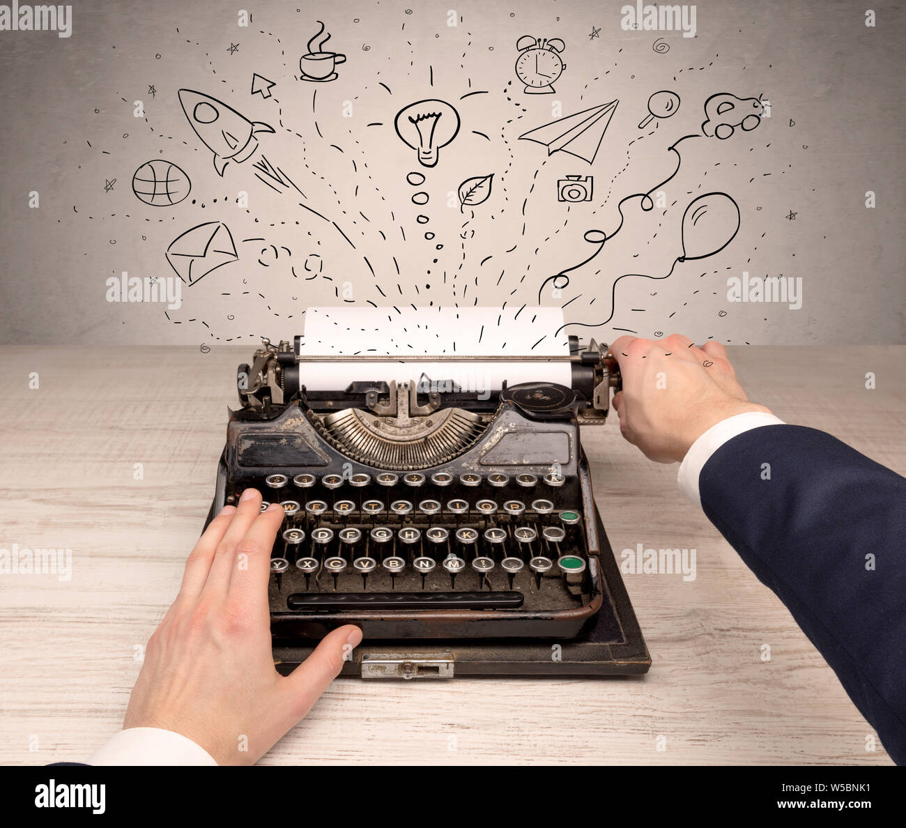 Typewriter with doodles, idea, message, plane, car balloon social media ...