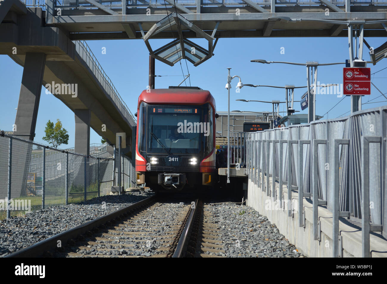 Transit train stopped at city station. Front view Stock Photo - Alamy