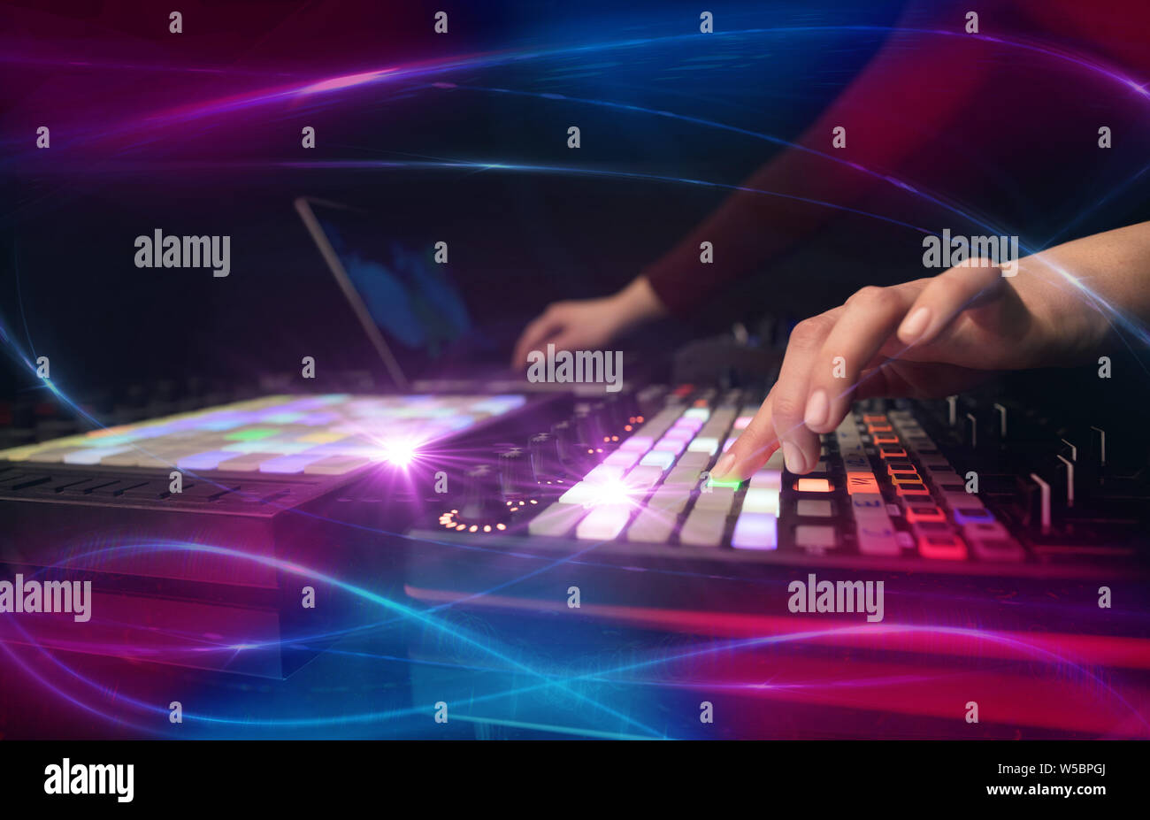 Hand mixing music on midi controller with wave vibe concept Stock Photo ...