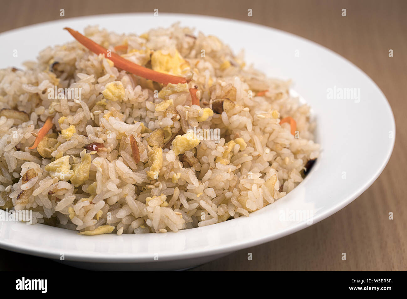 A close up of a bowl of vegetable fried rice Stock Photo - Alamy