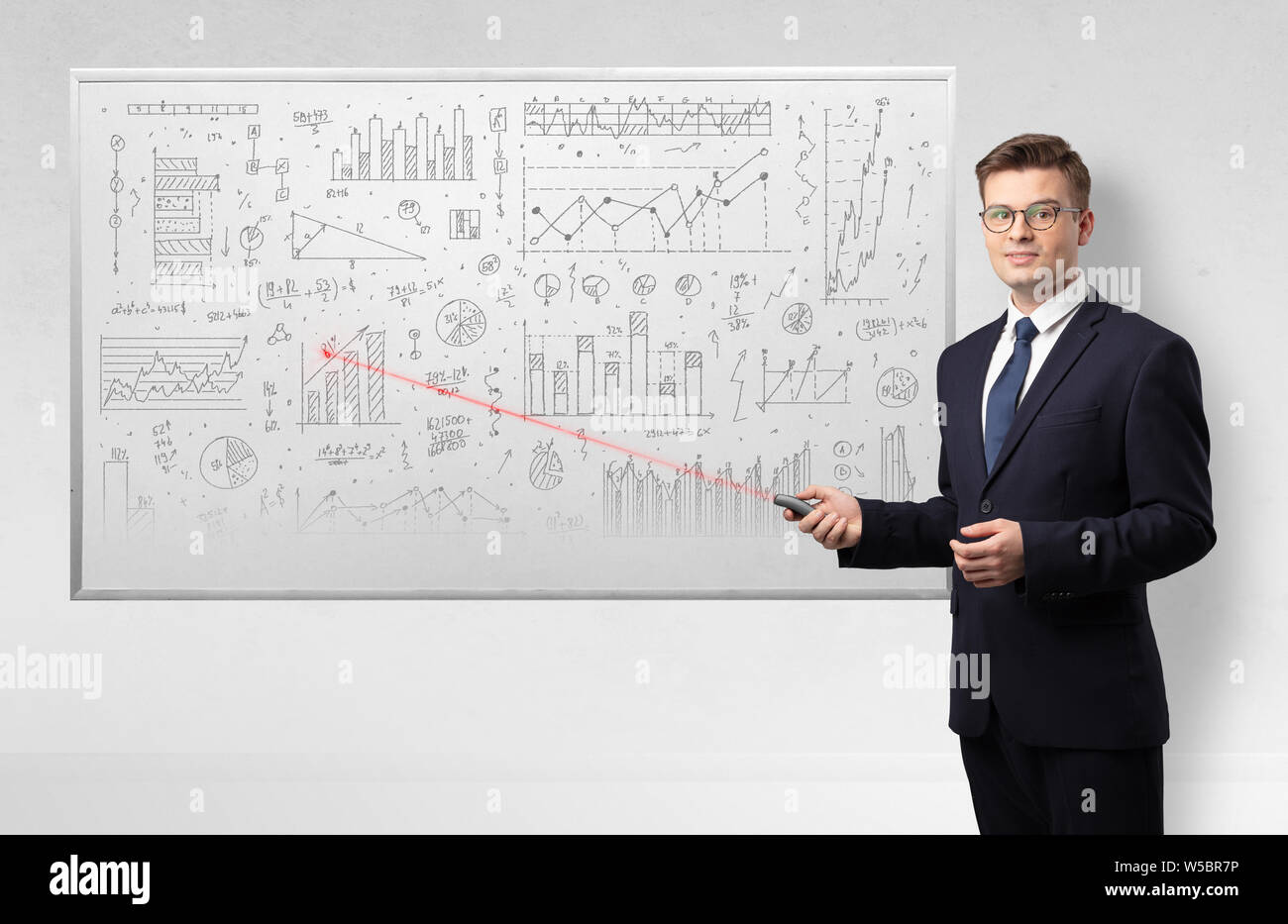 Professor with laser pointer teaching geometry Stock Photo - Alamy