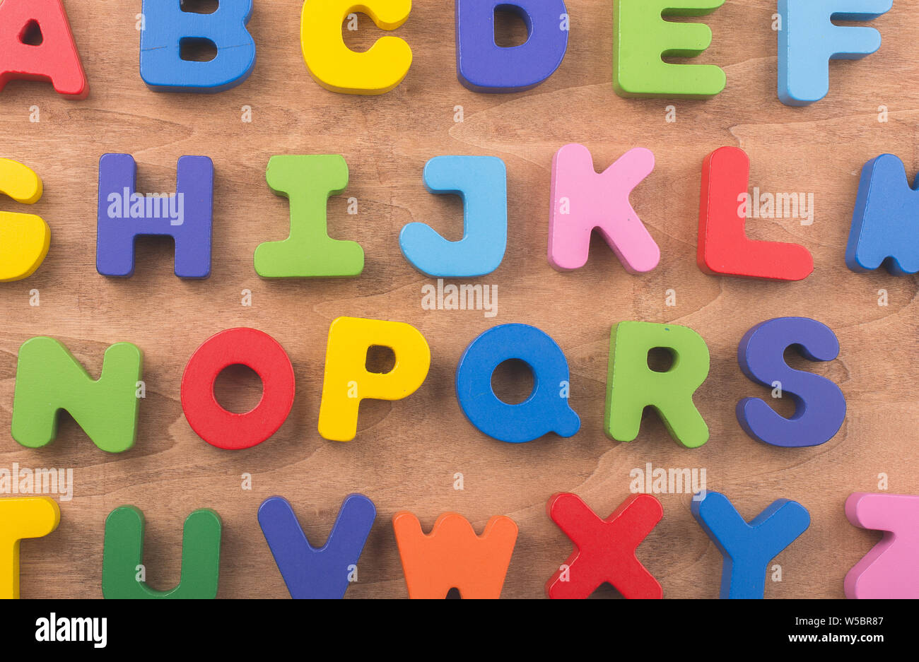 Colorful Letters of Alphabet made of wood Stock Photo - Alamy