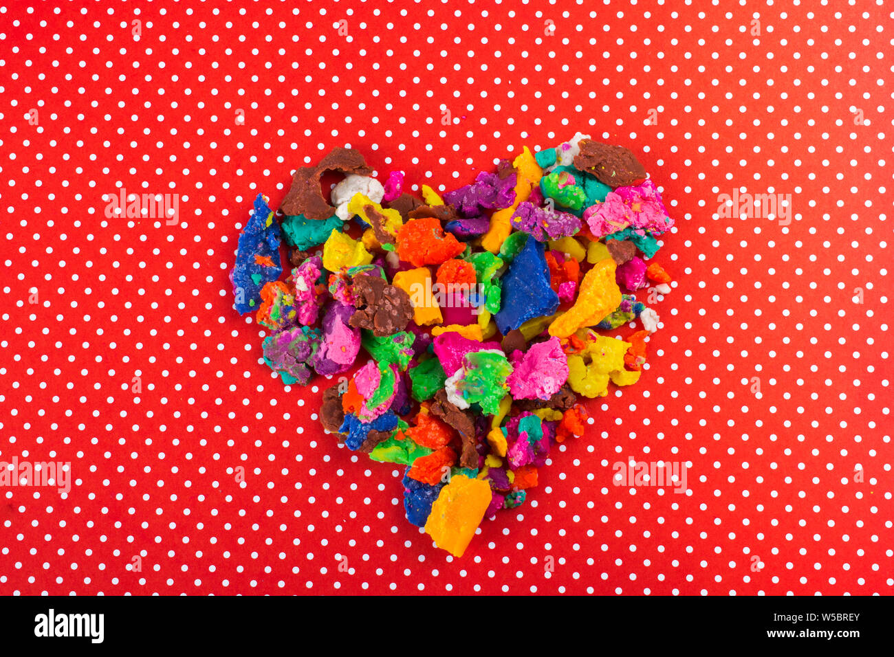 Dry colorful play dough in smal pieces Stock Photo - Alamy