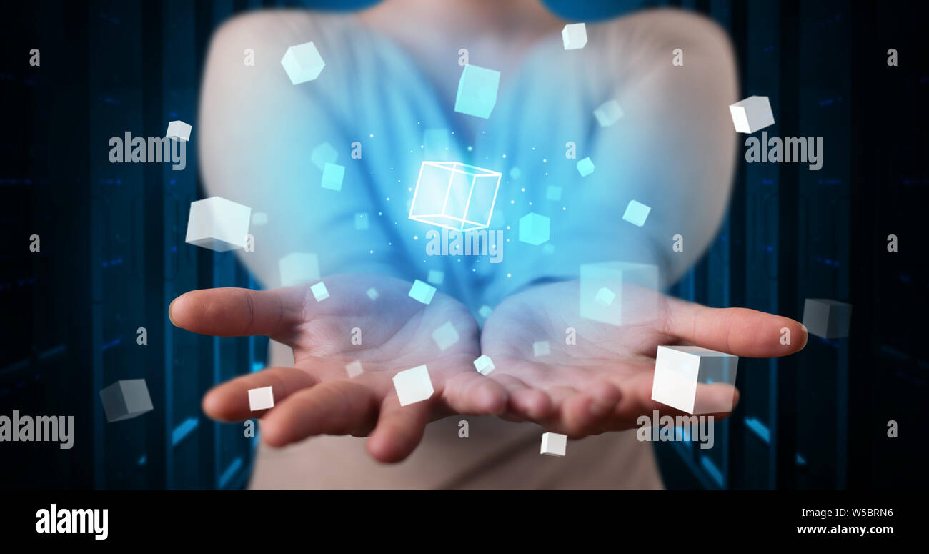 Person holding hologram projection displaying white cubes in server ...