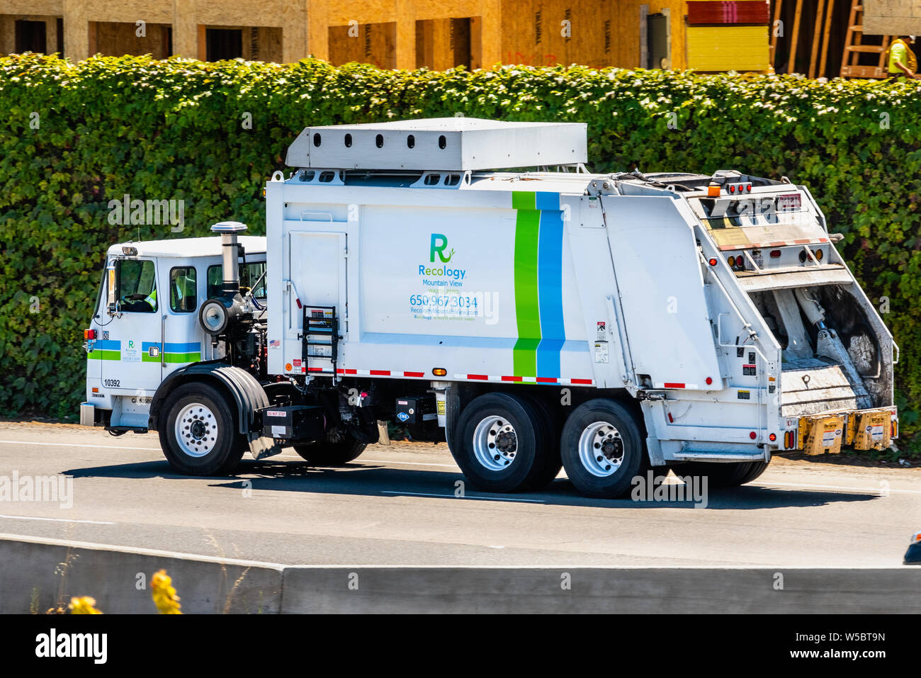 Garbage truck on landfill hi-res stock photography and images - Alamy